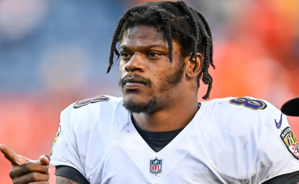 Video: Lamar Jackson has heated reaction after Bills fan smacks his ...